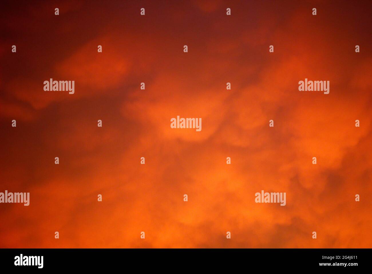 Fiery Sunset Sky with Clouds Stock Photo - Alamy
