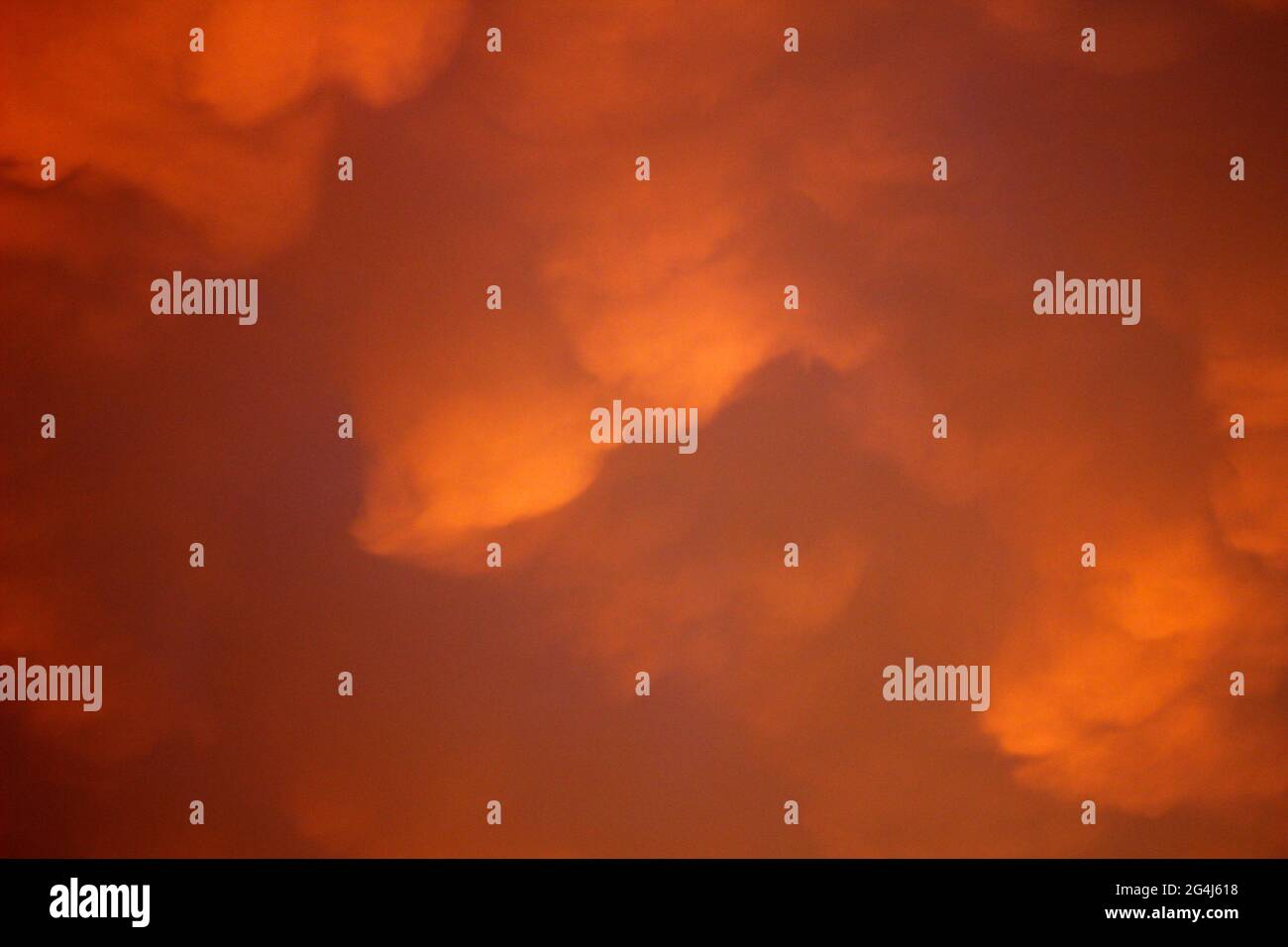 Fiery Sunset Sky with Clouds Stock Photo - Alamy
