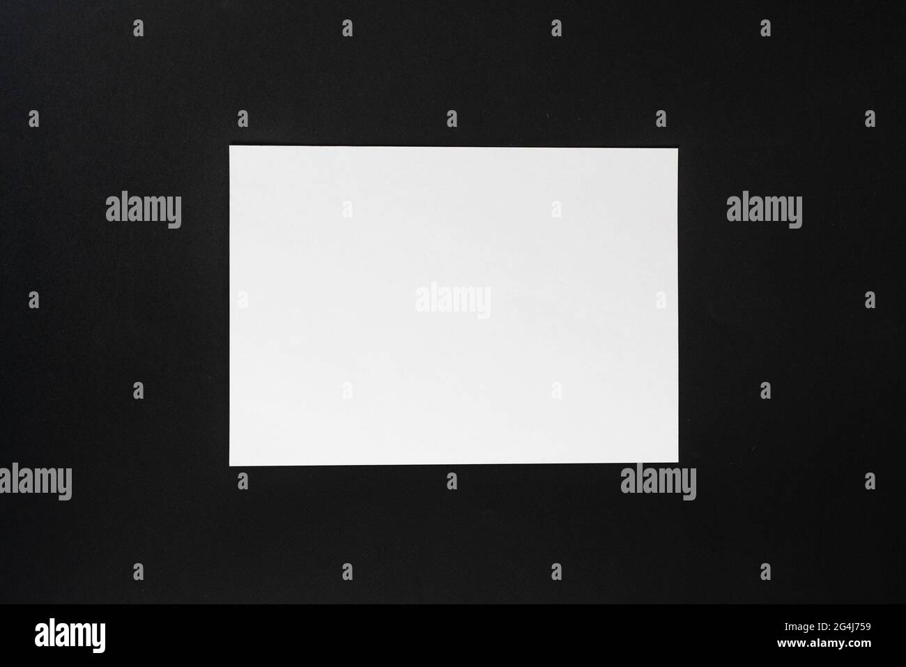 blank empty white paper sheet of a4 format on the table in office ...