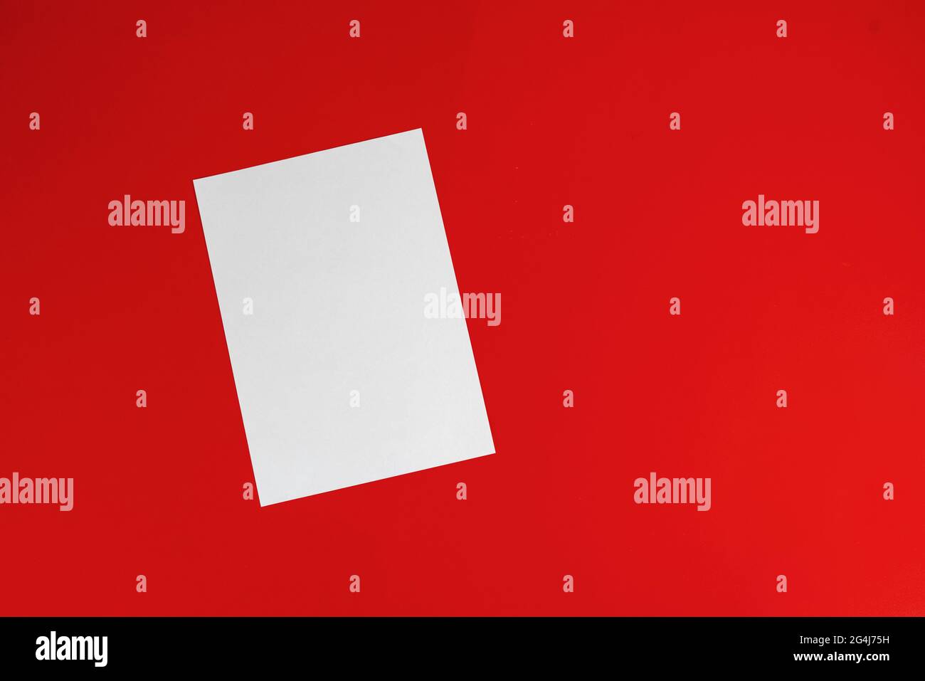 blank empty white paper sheet of a4 format on the table in office ...