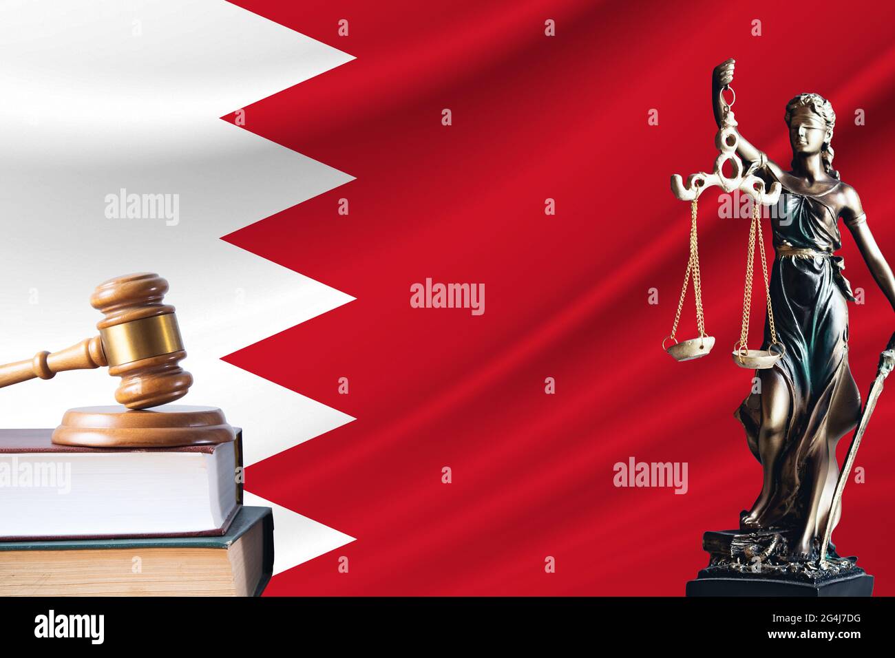 Law and justice in Bahrain. Statue of themis and the gavel of the judge ...