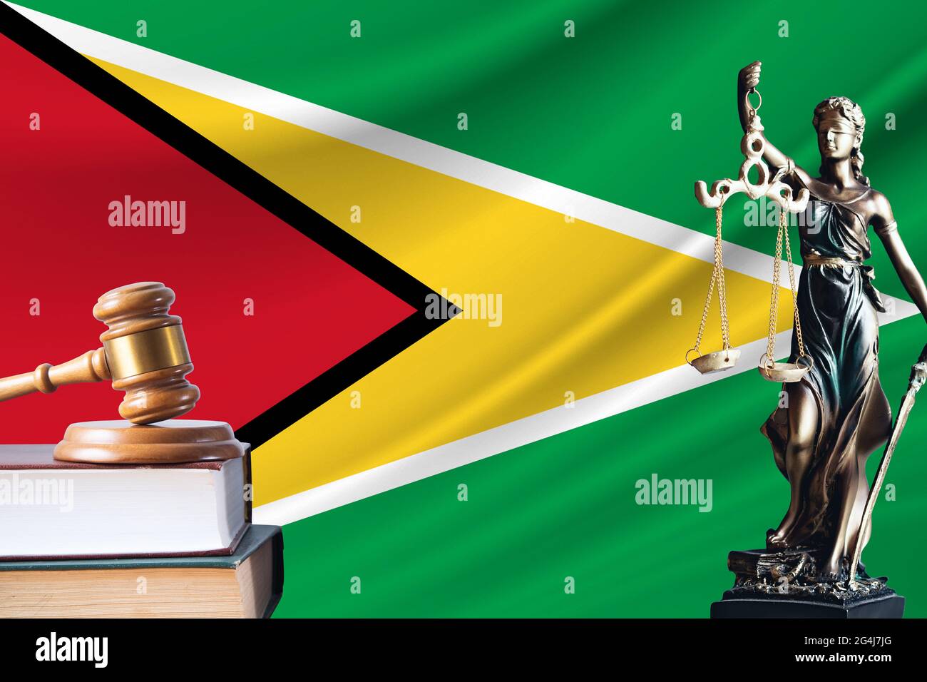 Law and justice in Guyana. Statue of themis and the gavel of the judge ...