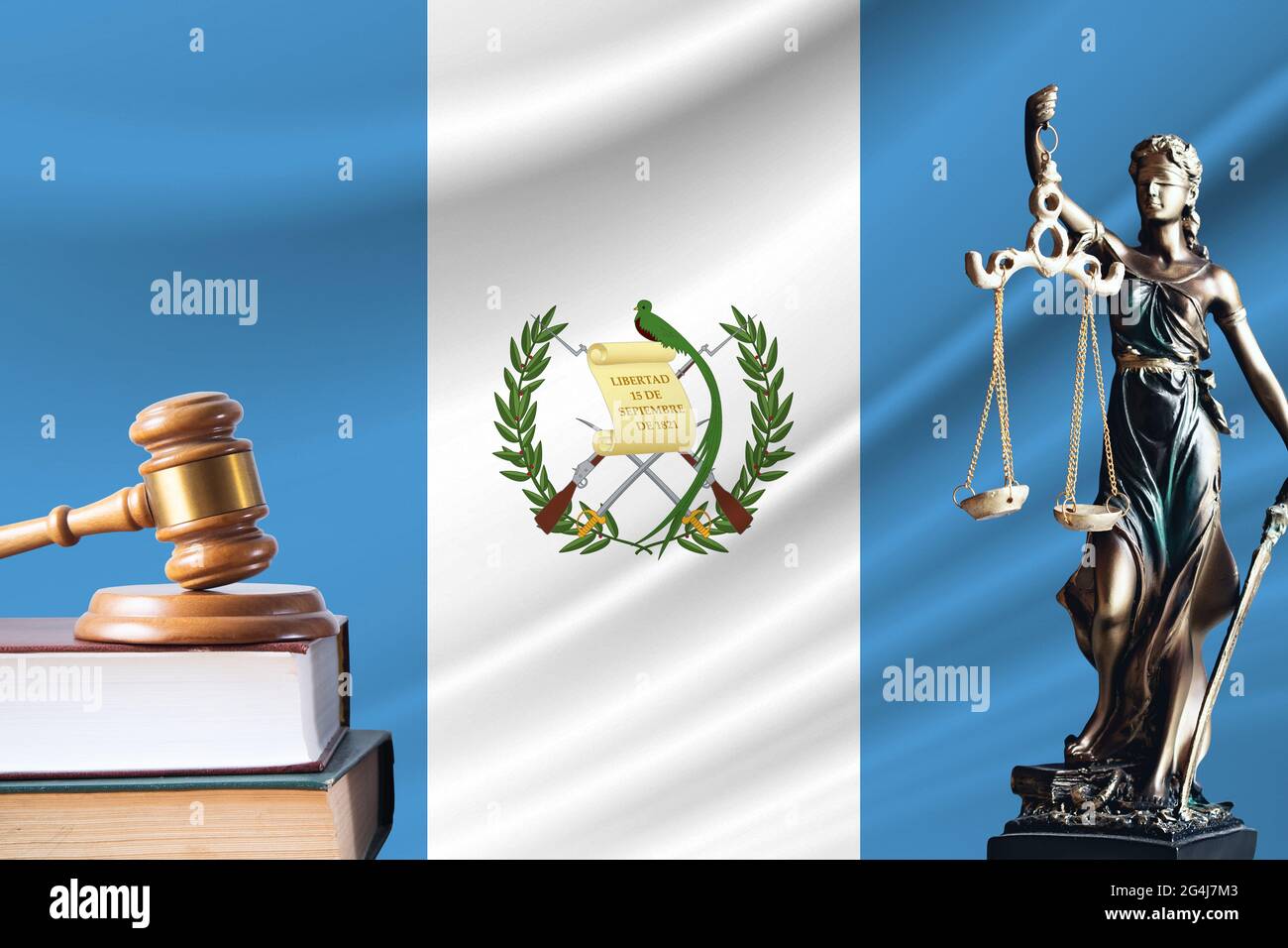 Law and justice in Guatemala. Statue of themis and the gavel of the ...