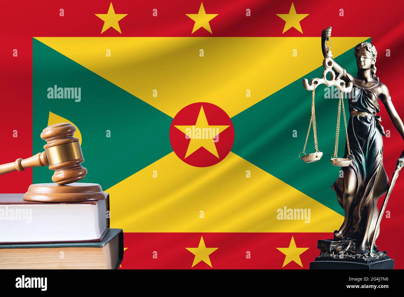 Law and justice in Grenada. Statue of themis and the gavel of the judge ...