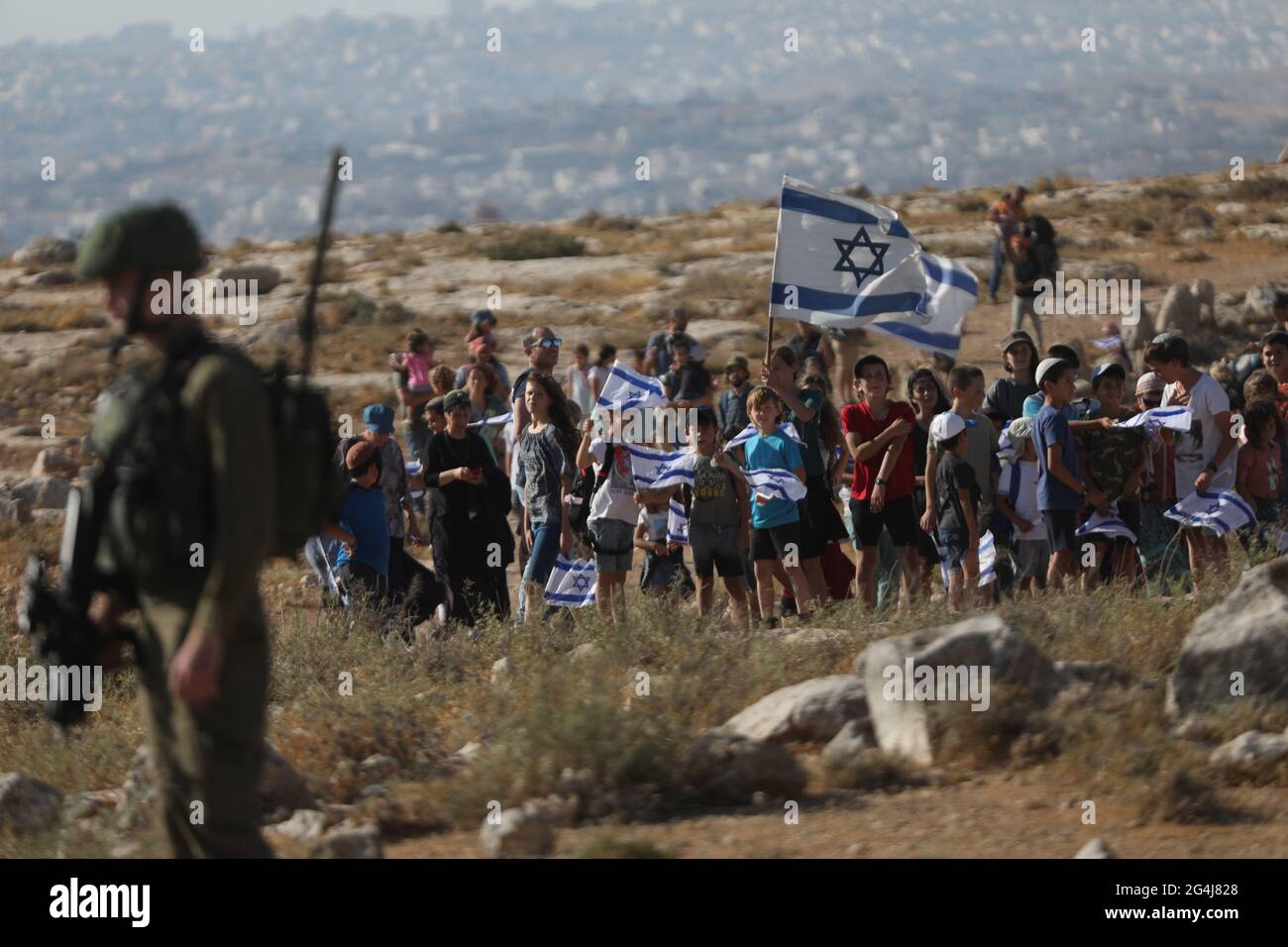 Carrying flags hi-res stock photography and images - Alamy