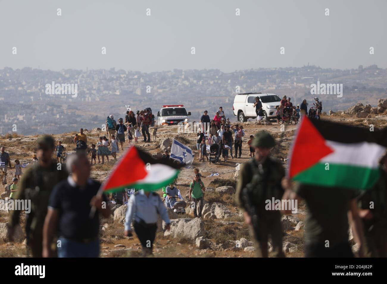 Carrying flags hi-res stock photography and images - Alamy