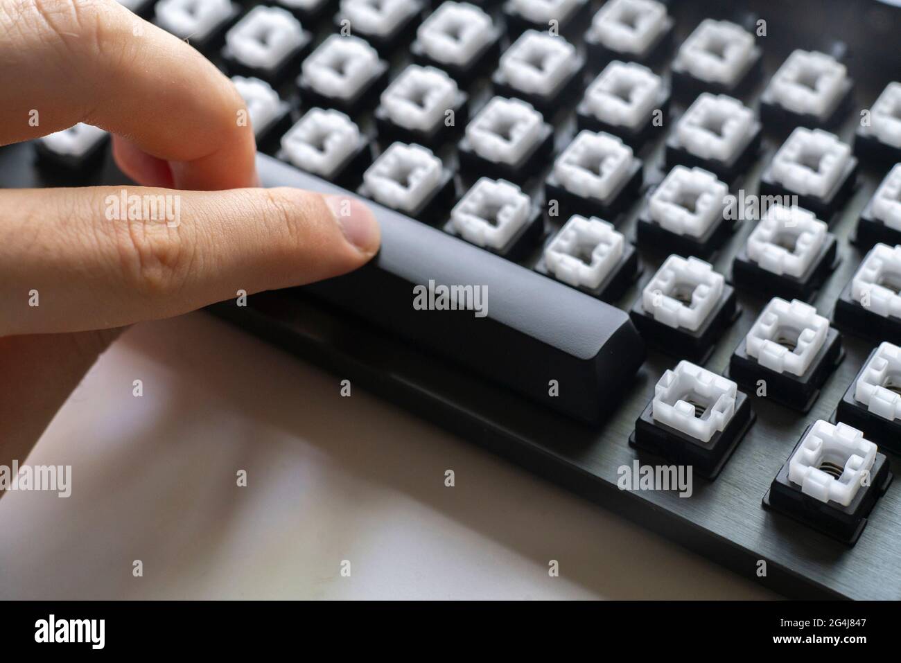 gamer push the button on a mechanical keyboard with mechanical switches ...