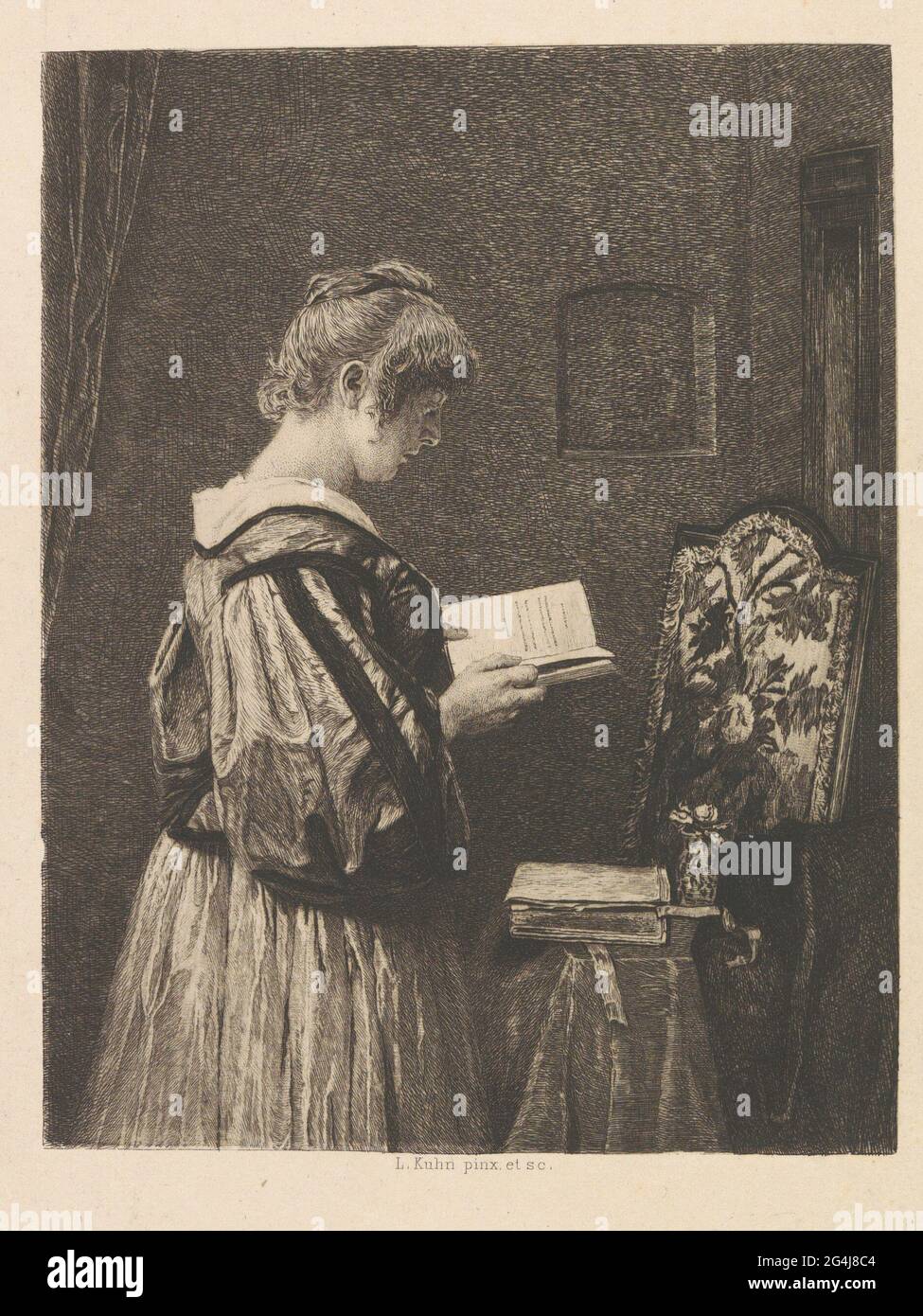 Standing woman in an interior, reading in a book; La Lecture Stock ...