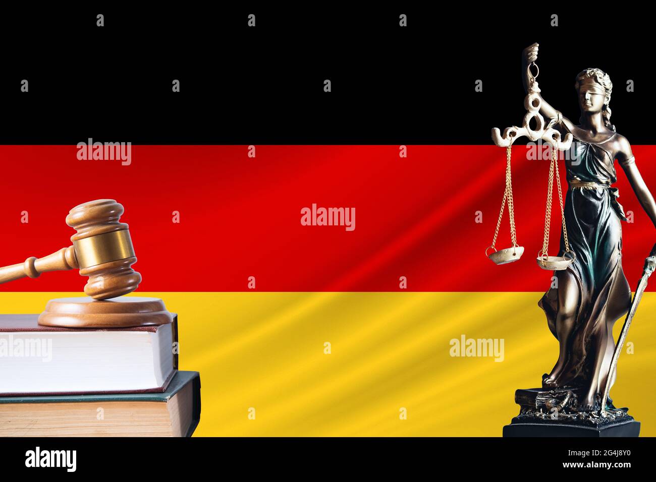 Law and justice in Germany. Statue of themis and the gavel of the judge ...