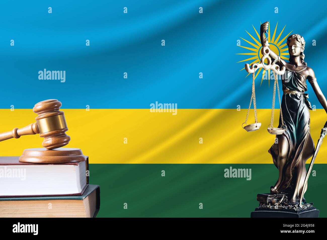 Law and justice in Rwanda. Statue of themis and the gavel of the judge ...