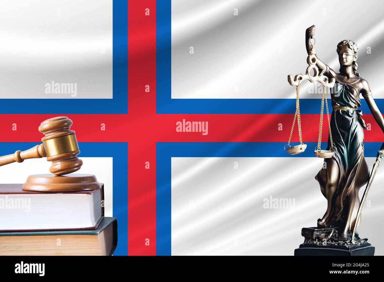 Law and justice in Faroe Islands. Statue of themis and the gavel of the ...