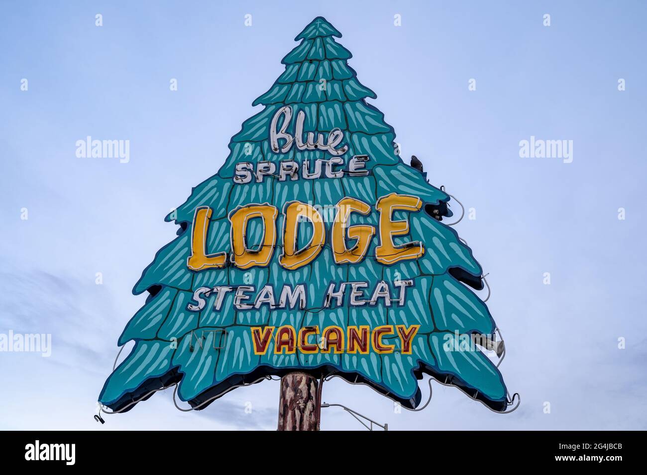 Gallup, New Mexico - May 18, 2021: Sign for the Blue Spruce Lodge, a ...