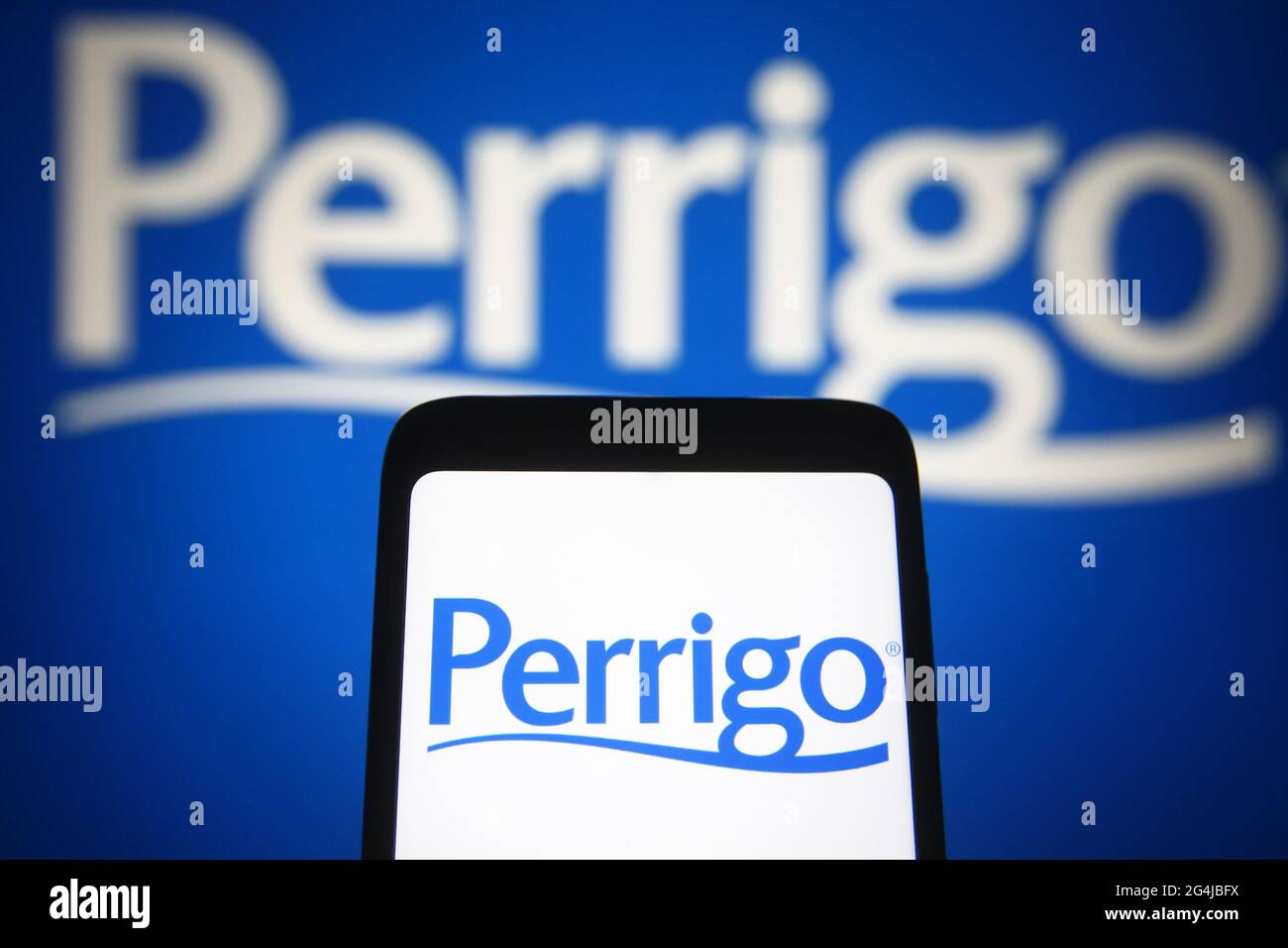 In this photo illustration a Perrigo Company logo of a pharmaceutical ...