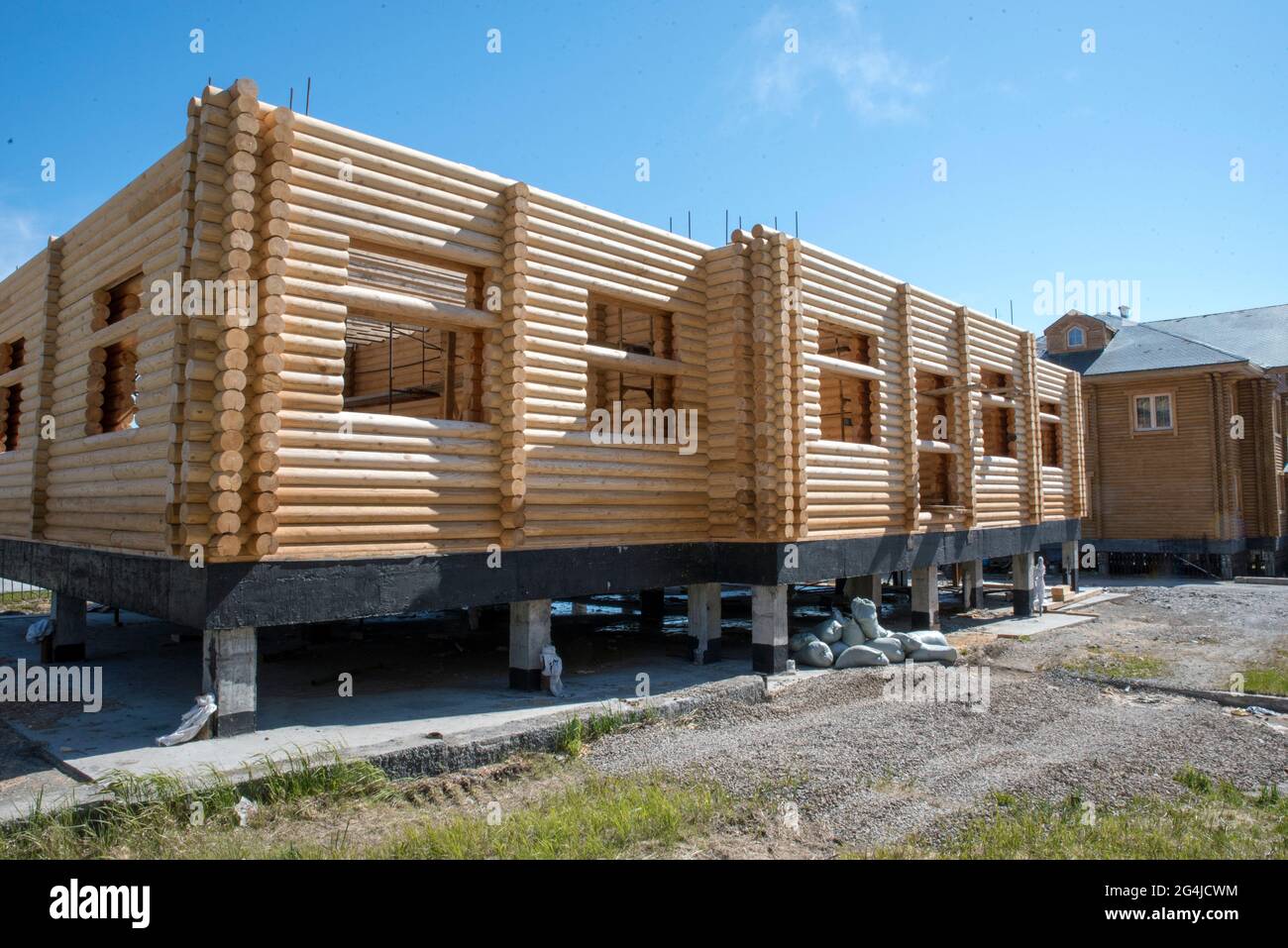 Construction of wooden house, exterior Stock Photo - Alamy