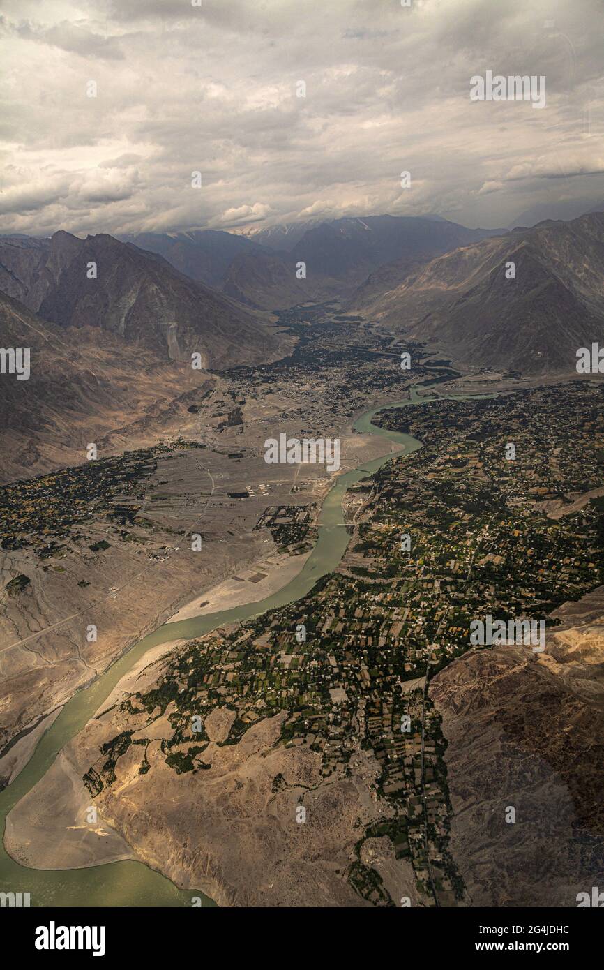 Vertical shot of the Indus river and Karakorum range in northern areas ...