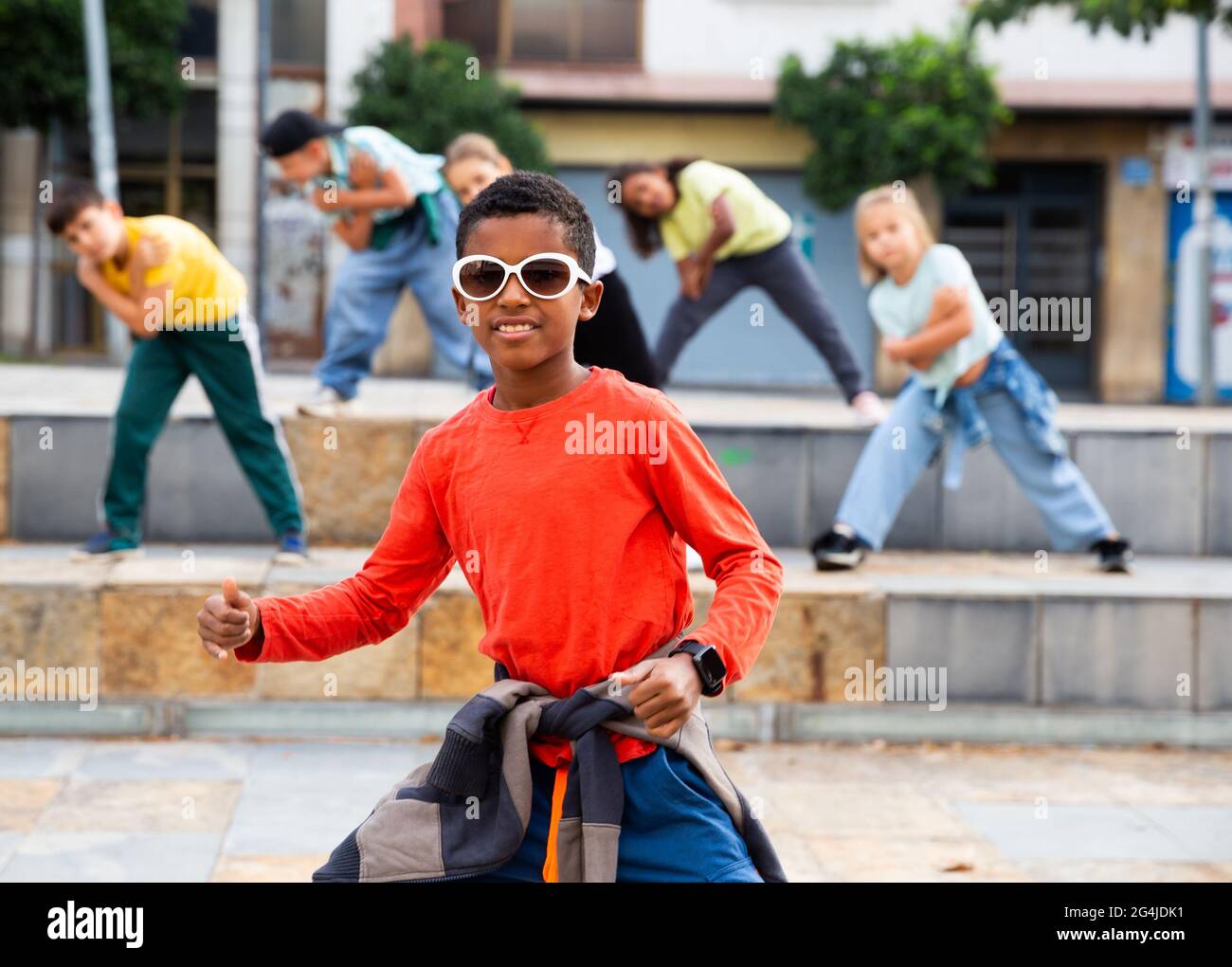 Boy hip hop dancer exercising outdoors Stock Photo - Alamy
