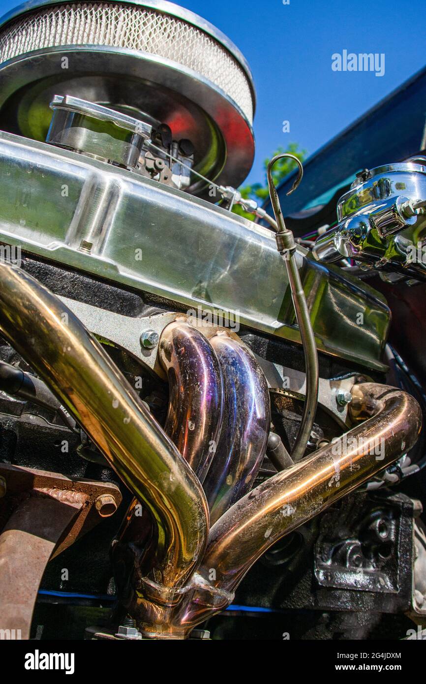 Closeup shot of the vehicle engine with golden pipes - technology Stock ...