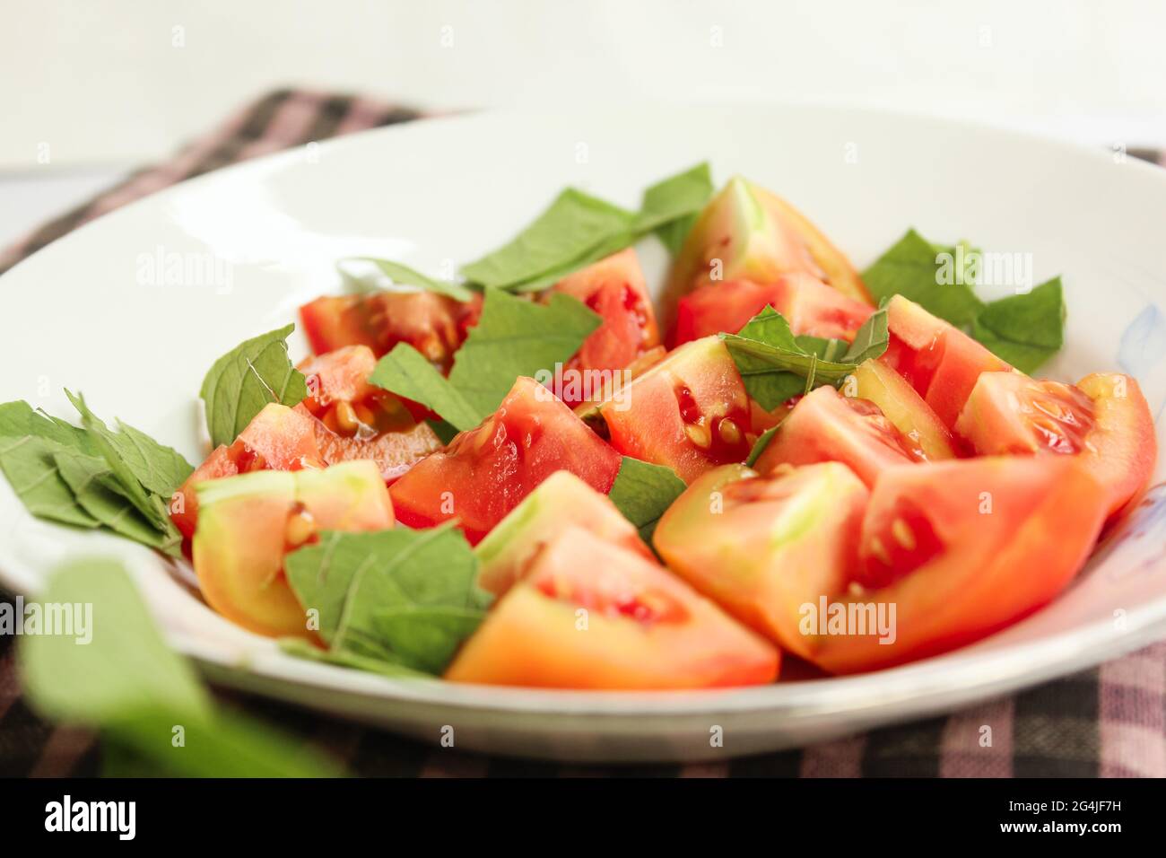 Taste tomato hi-res stock photography and images - Alamy