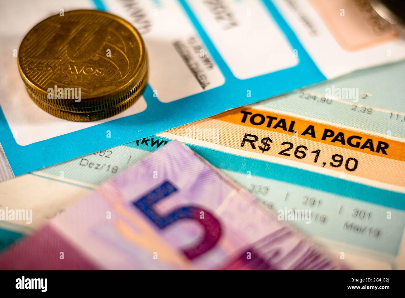 In this illustration an electricity bill indicating the total amount to ...