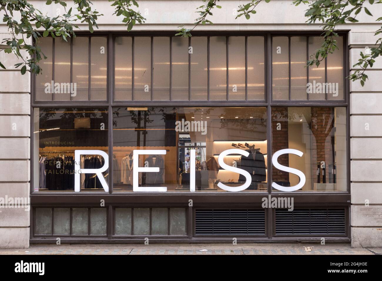 Reiss logo is seen at one of their stores on Oxford Street in London ...
