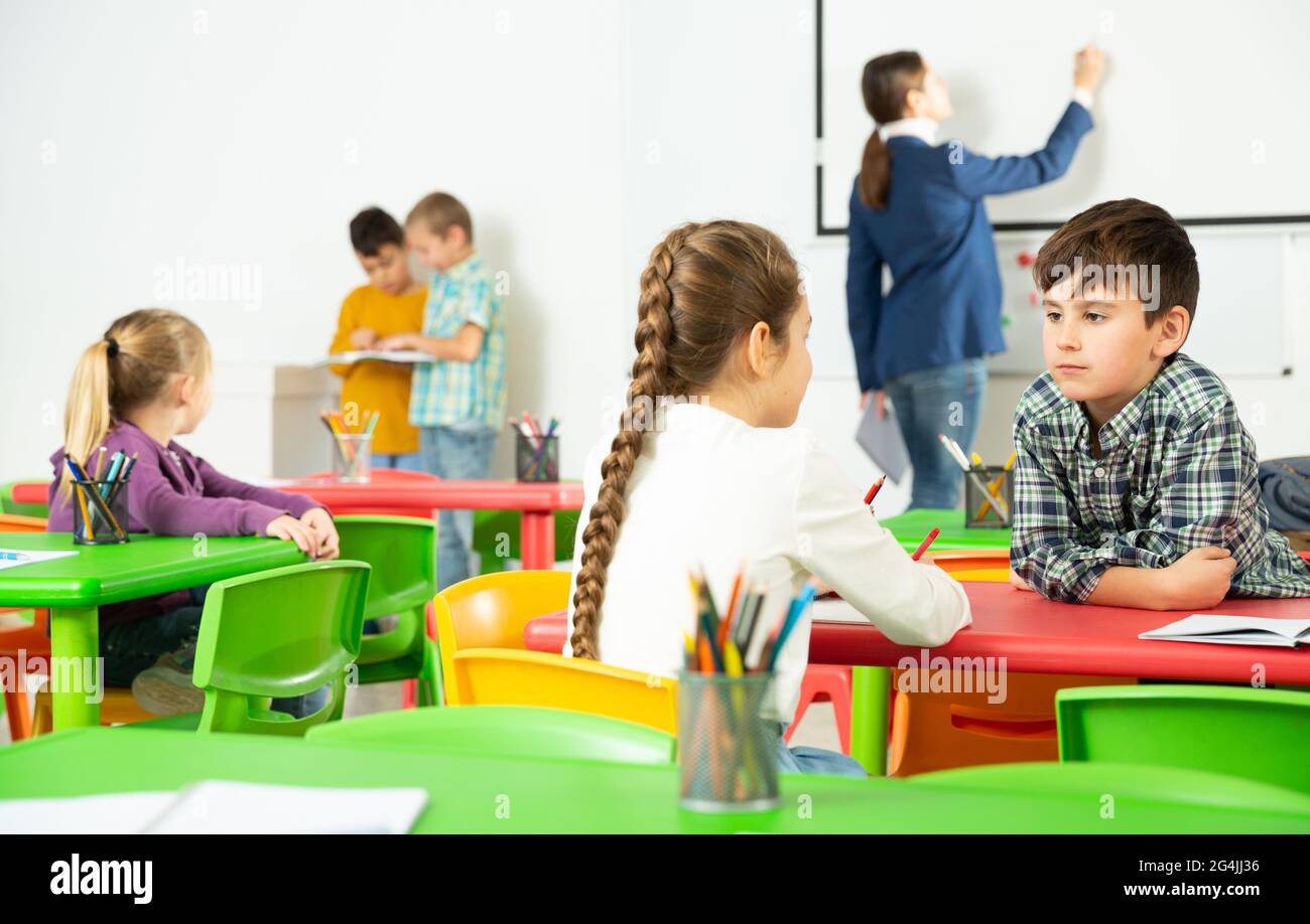 Kids at school recess talking hi-res stock photography and images - Alamy