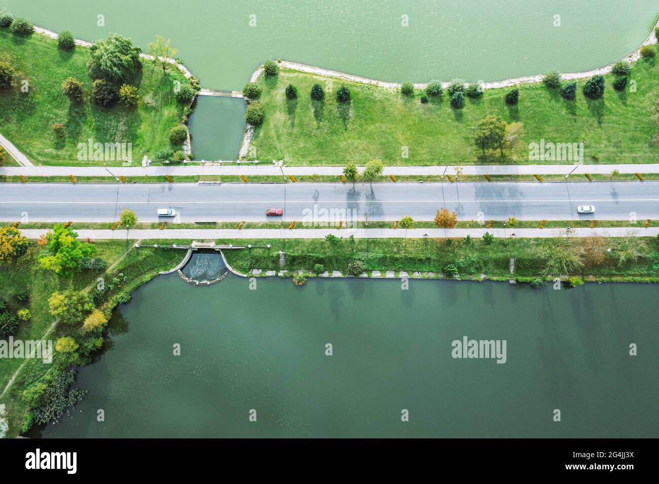 aerial top view from flying drone of asphalt road on dam. summer nature ...