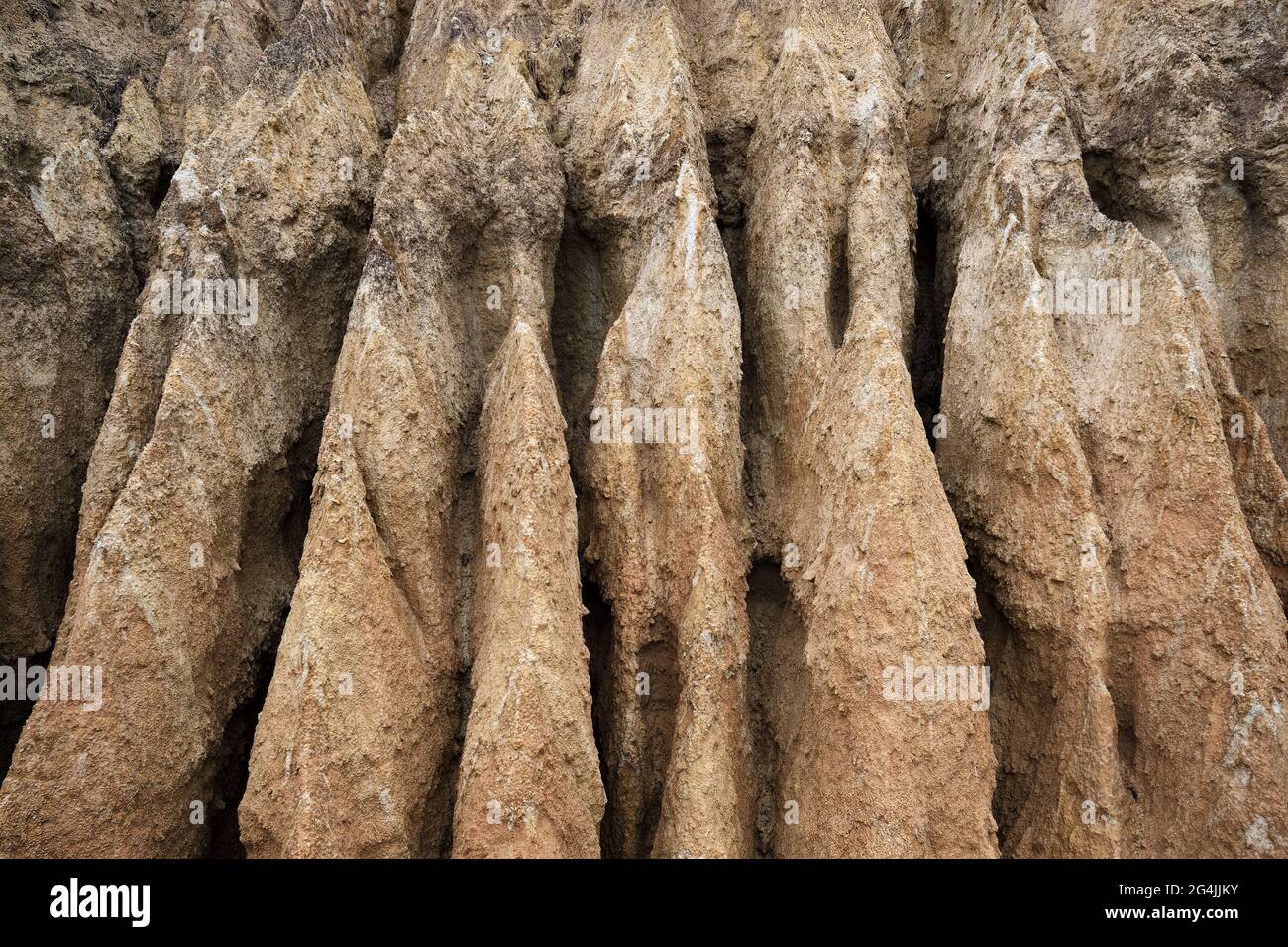 Landscape with large gullies from clay soil erosion Stock Photo - Alamy