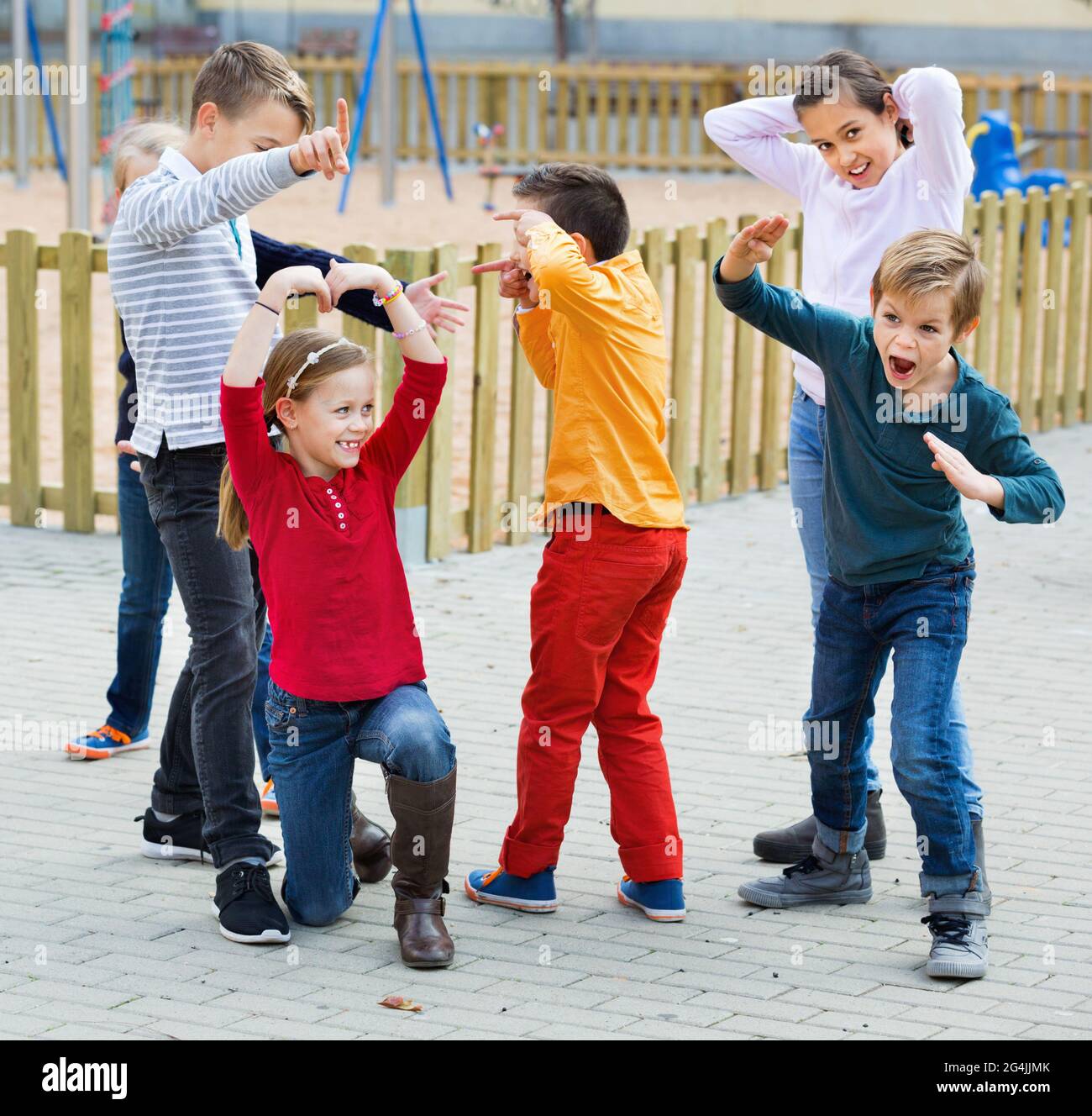 Acting game with children making performance Stock Photo - Alamy