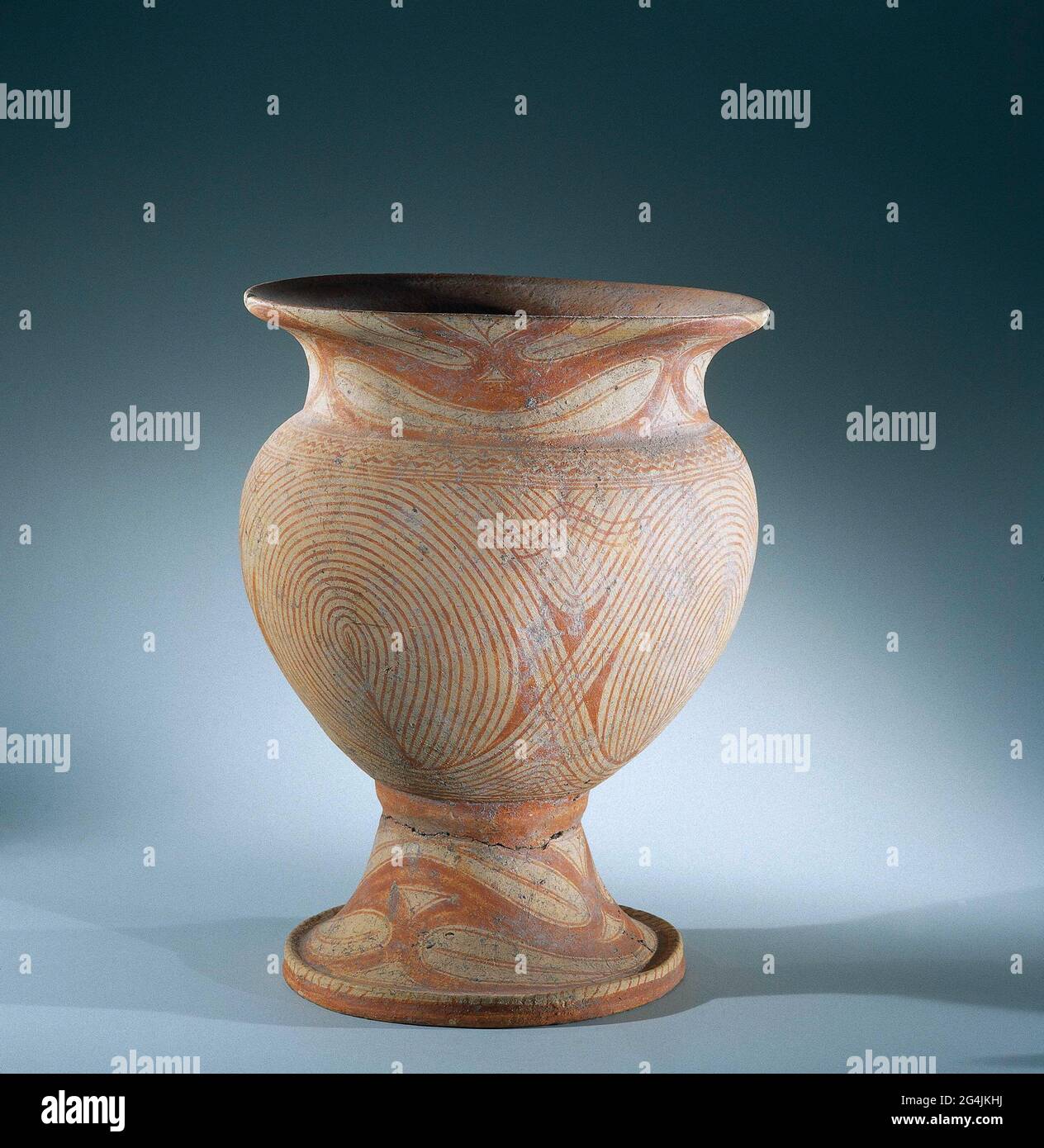 . Egg-shaped pot on high, spreading foot of pottery with a wide, flared ...