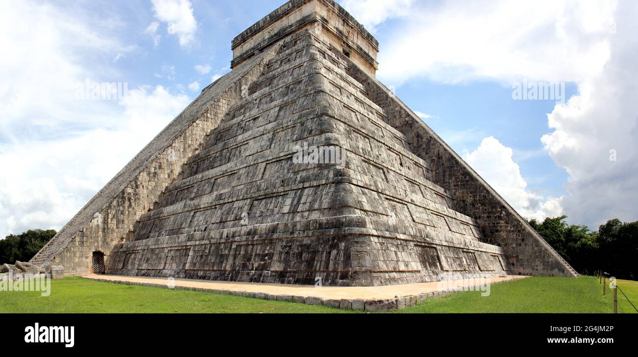 Temple of Kukulcan (El Castillo) in the center of the archaeological site, panoramic closeup ...