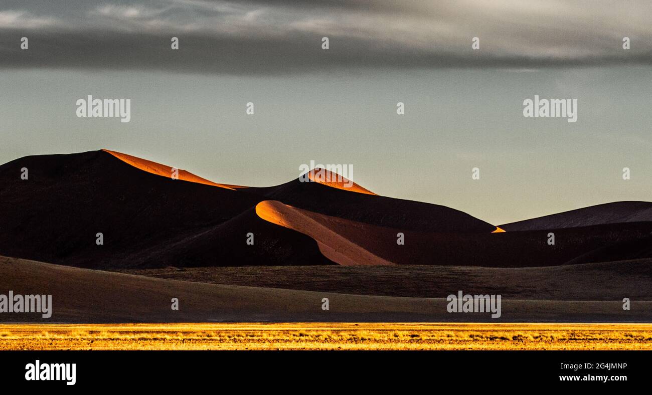 Sossusvlei sand dunes - salt and clay pan surrounded by high red sand ...