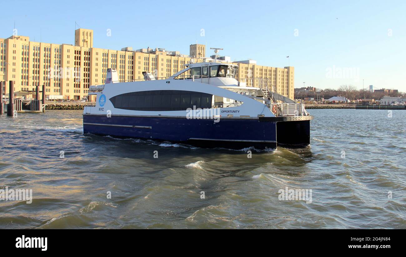 Commuter ferry boat OPPORTUNITY departing a pier at the Brooklyn Army ...