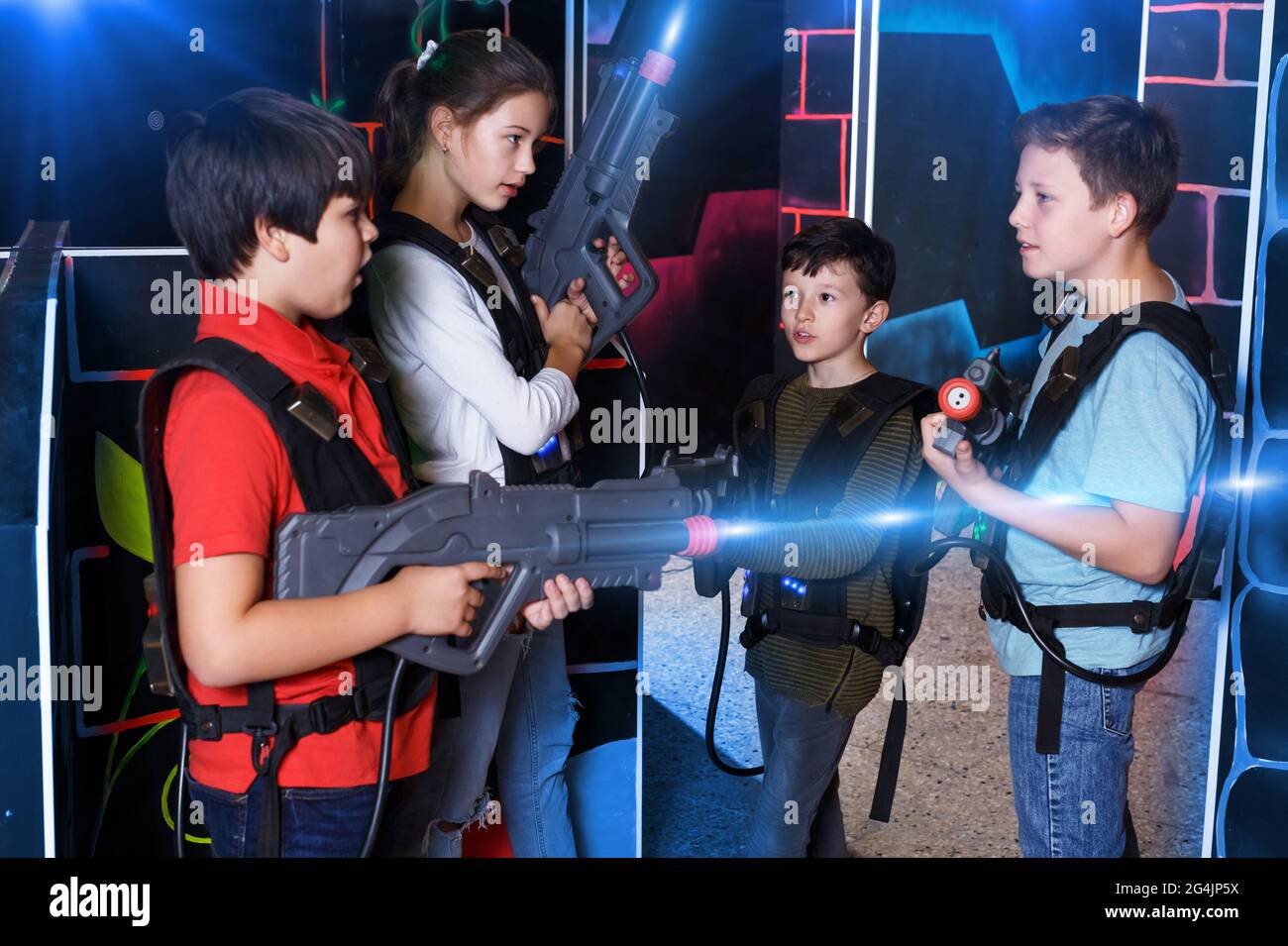 Kids posing with laser pistols Stock Photo - Alamy