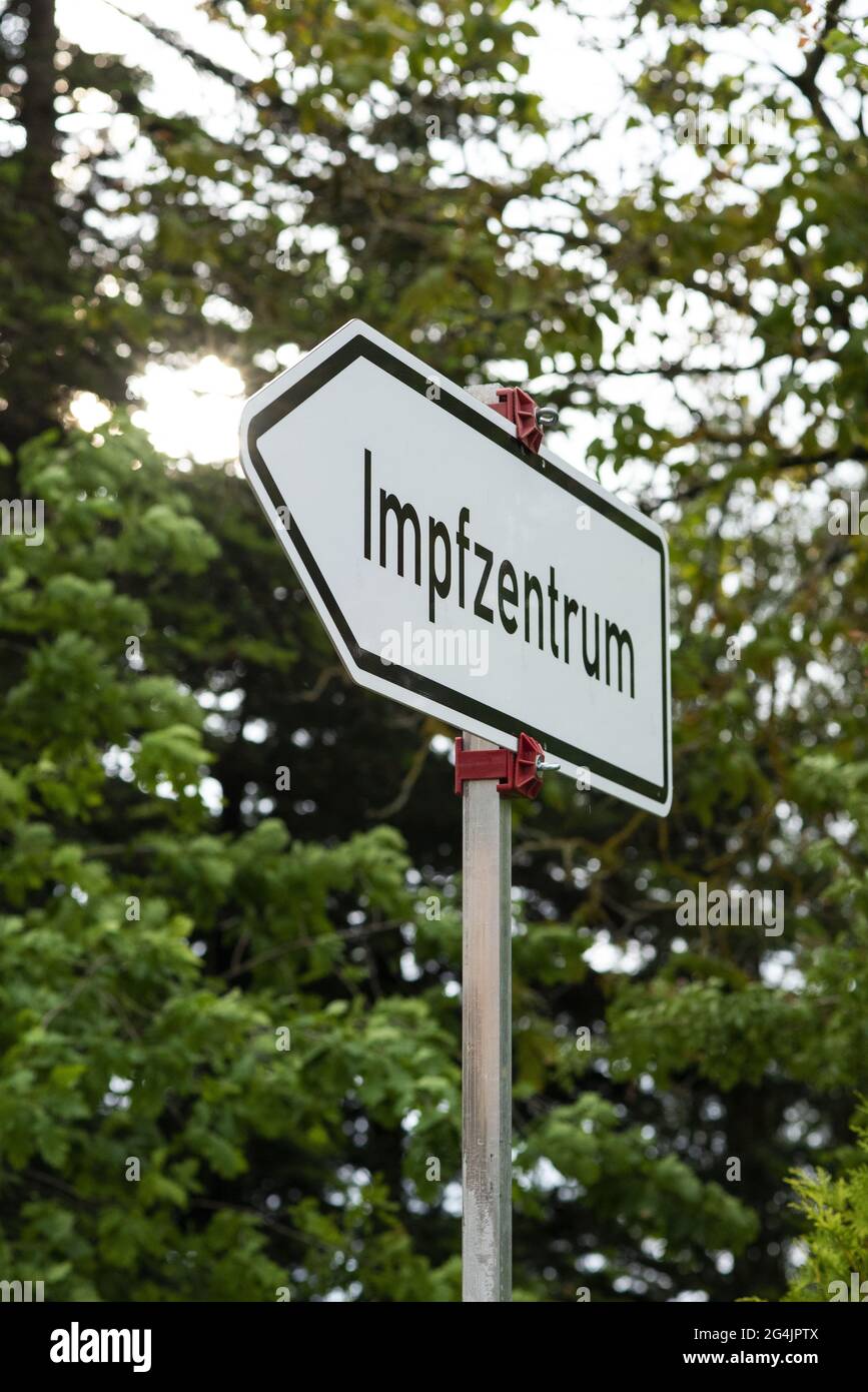 Selective focus of a road sign with a German text with vaccination ...