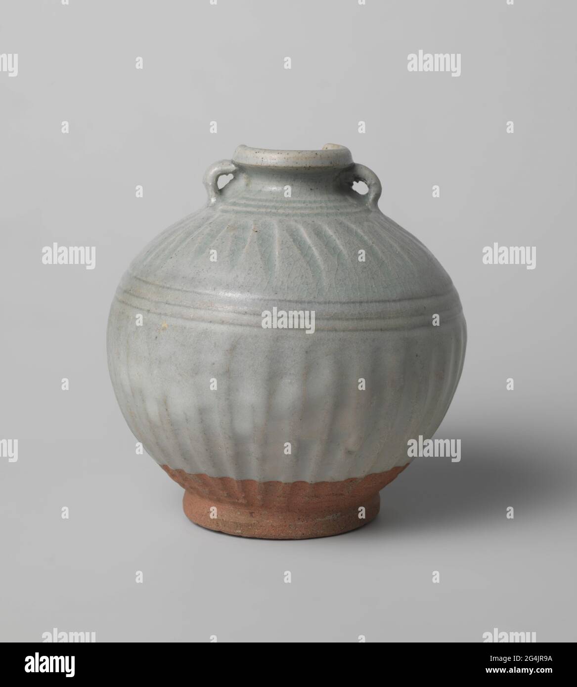Round bodied jar with fluted sides. Spher-shaped pot of stoneware with ...