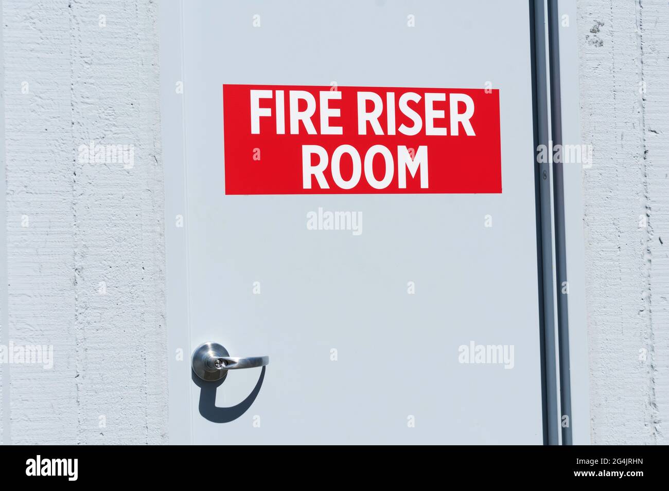 Fire Riser Room sign on the door leading to dedicated space for fire ...