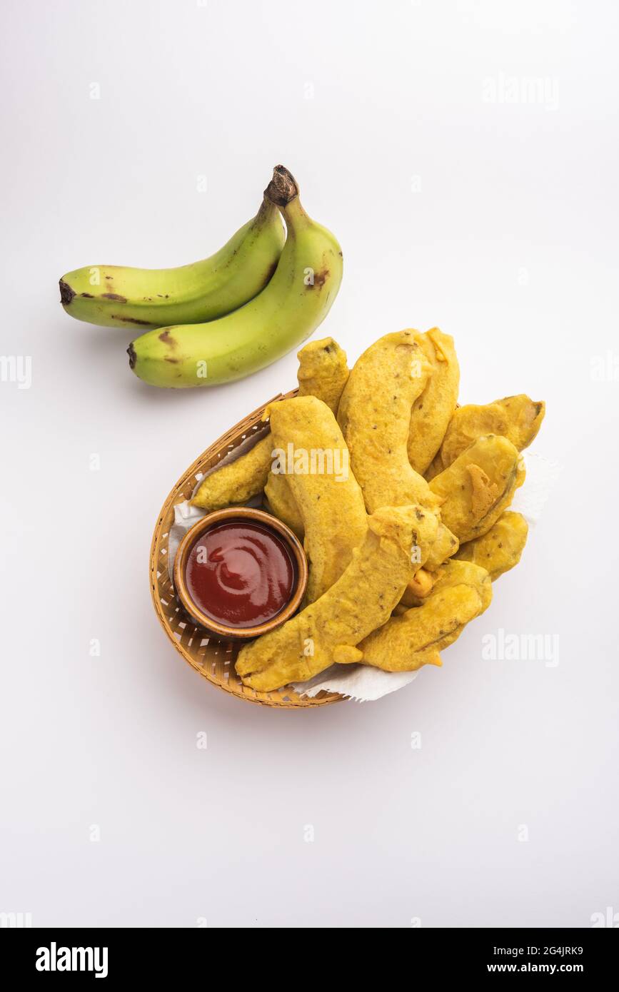 Banana Fritter or pakora or raw kela pakoda or bajji served with ...