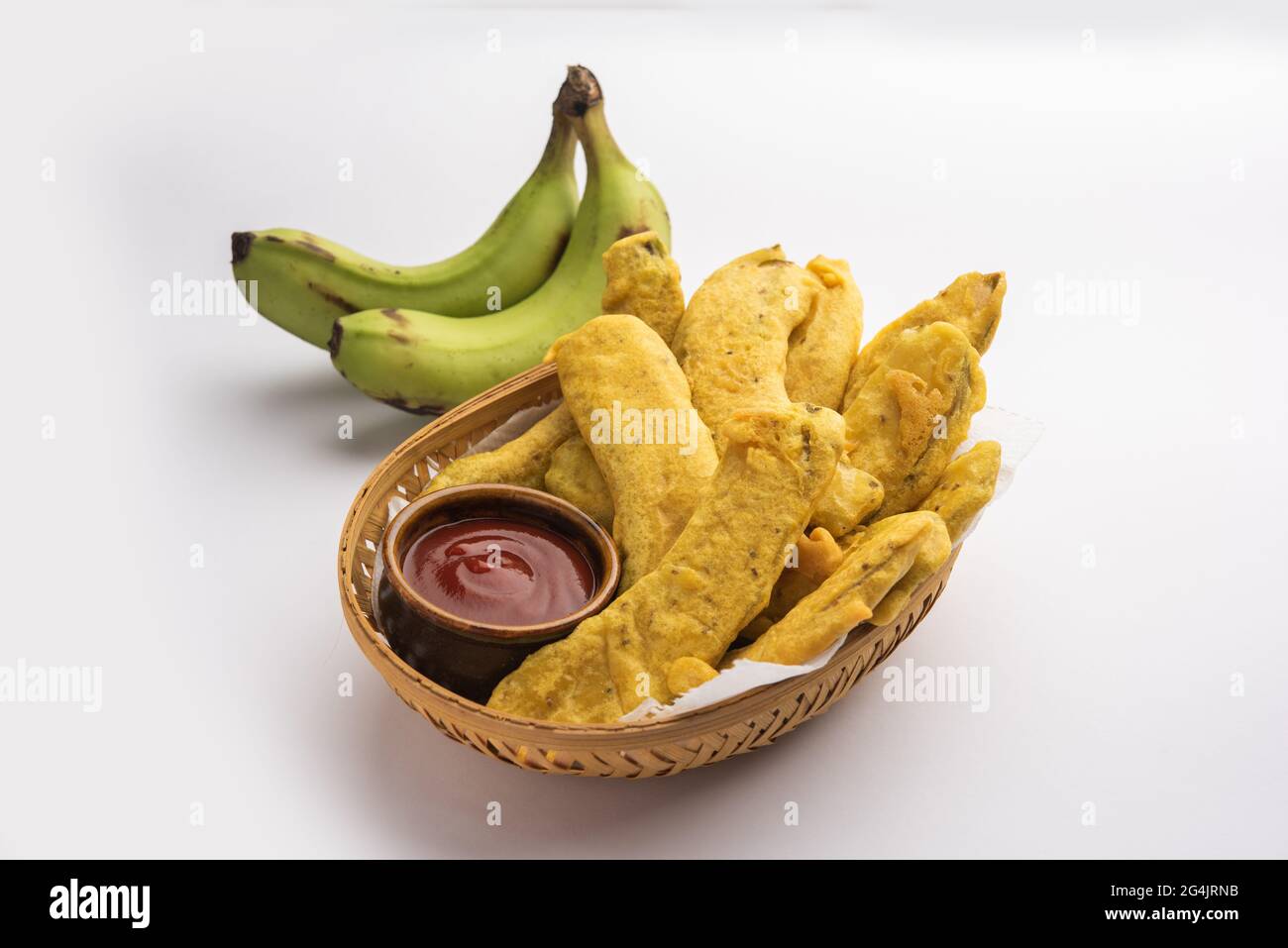 Banana Fritter or pakora or raw kela pakoda or bajji served with ...