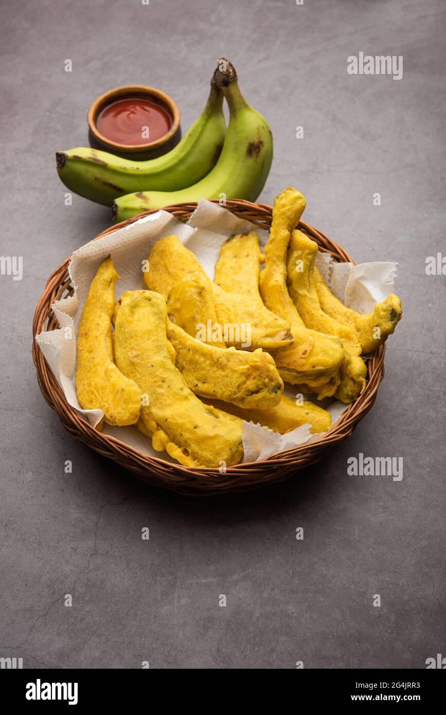 Banana Fritter or pakora or raw kela pakoda or bajji served with ...