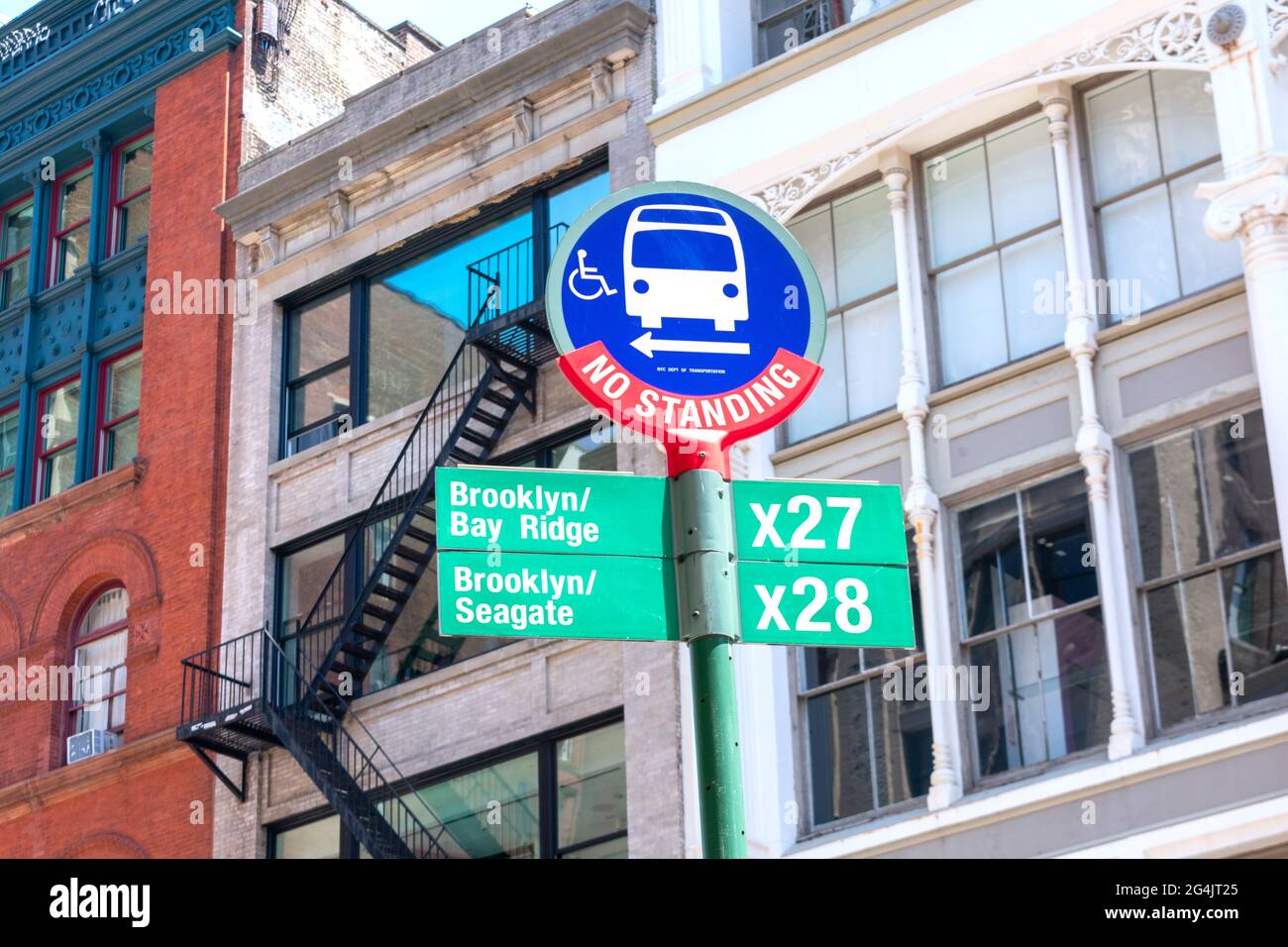 A bus stop sign by Metropolitan Transportation Authority in SoHo ...