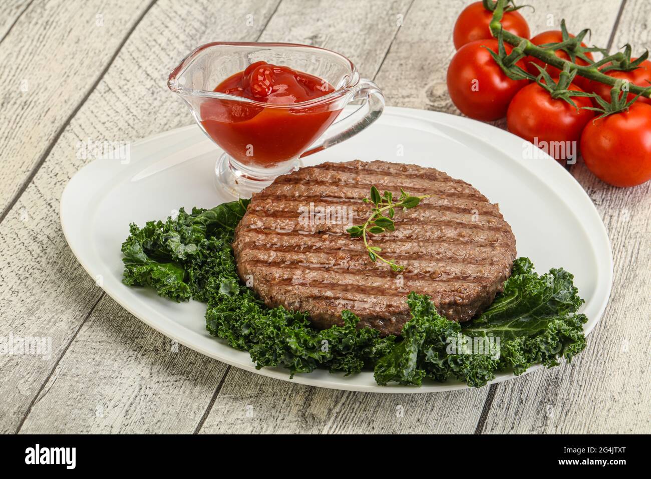 Grilled tasty beef cutlet for burger Stock Photo - Alamy