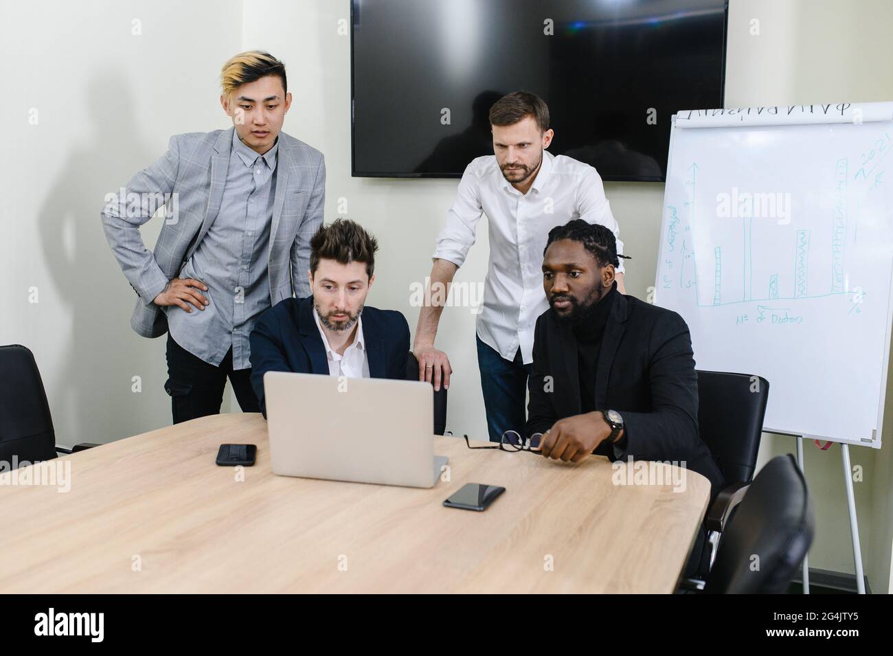 Multiracial group workers in office hi-res stock photography and images ...