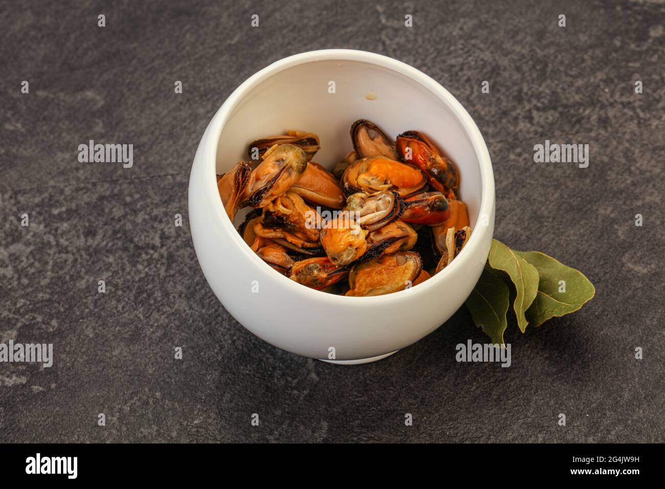 Pickled mussels with spices in the bowl Stock Photo - Alamy