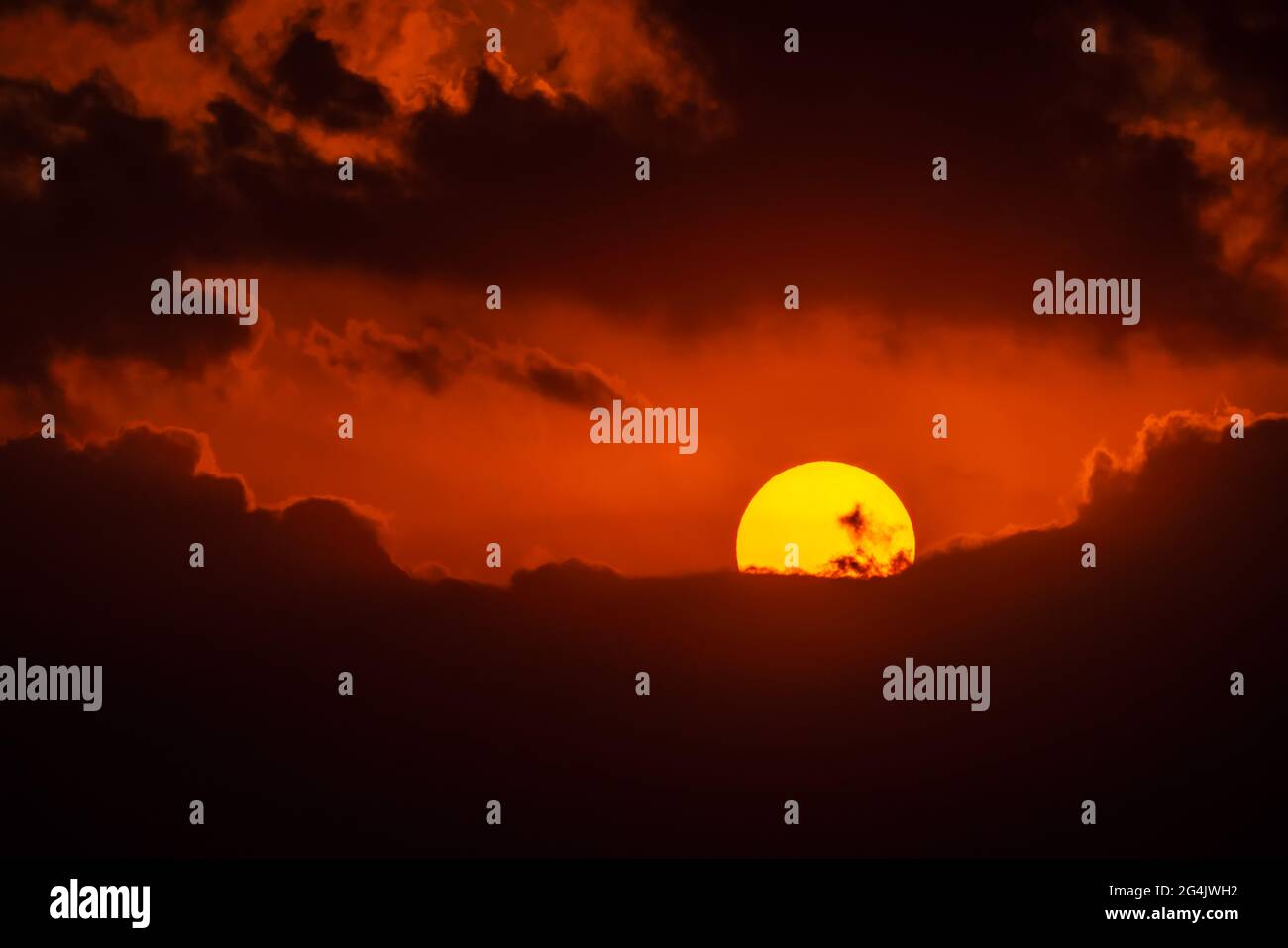 The sun in a cloud Stock Photo - Alamy