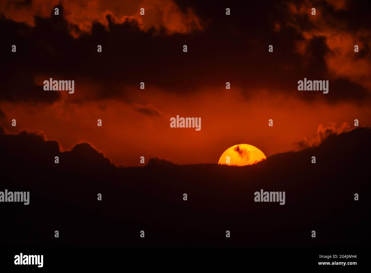The sun in a cloud Stock Photo - Alamy