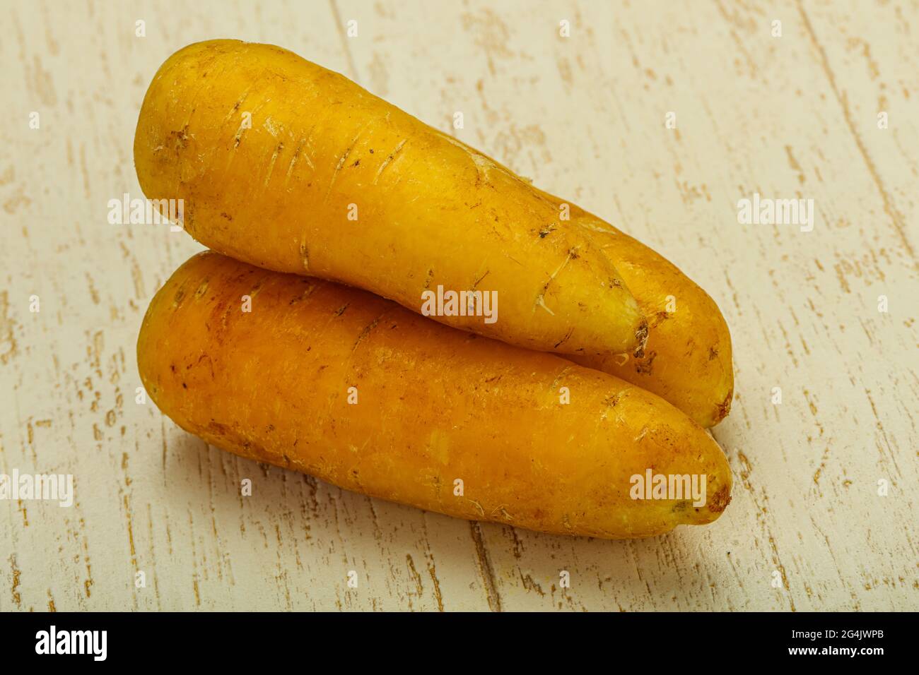 Natural vegan food - Raw Yellow carrot Stock Photo - Alamy