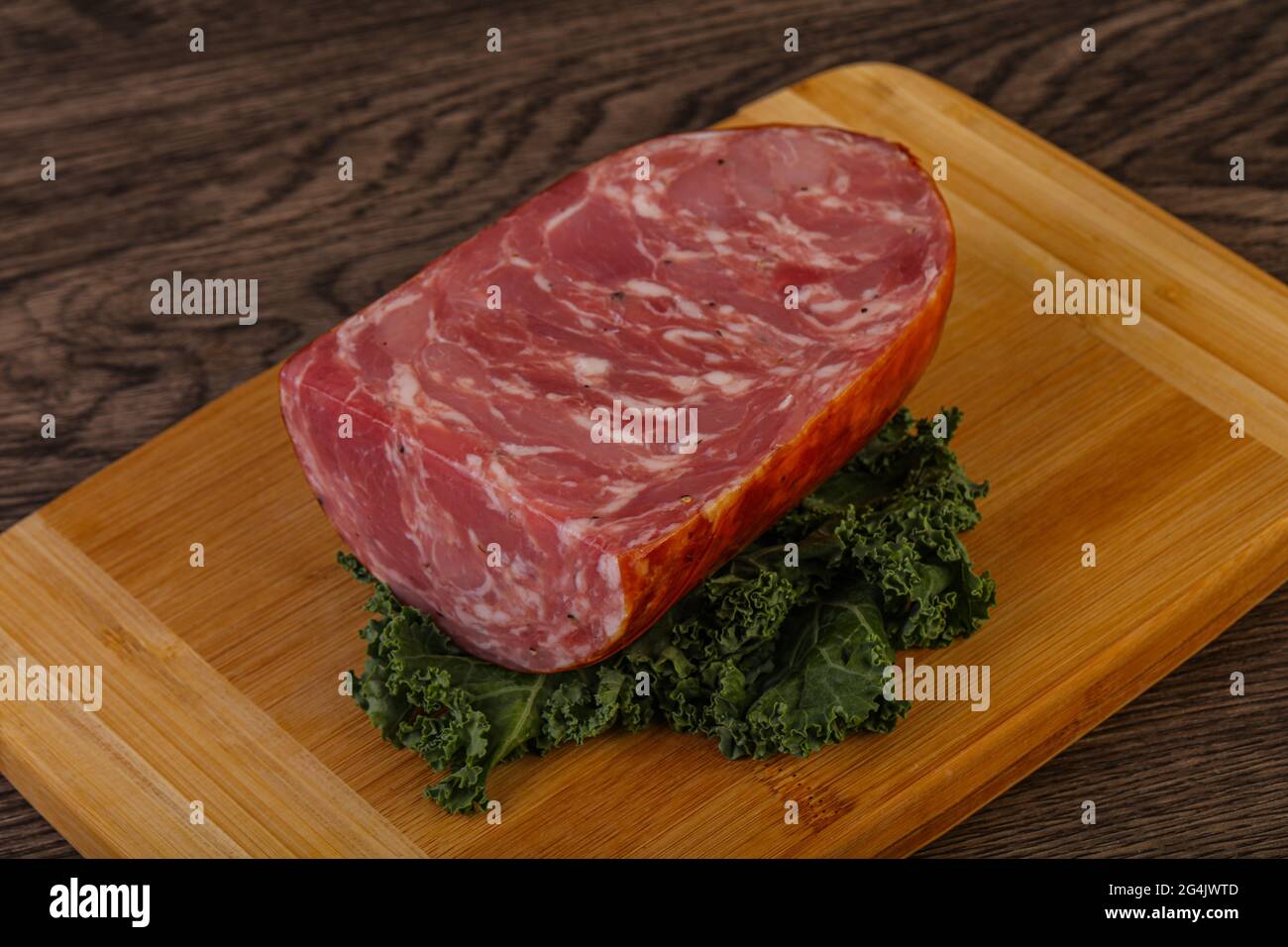 Tasty Beef ham piece over board Stock Photo - Alamy