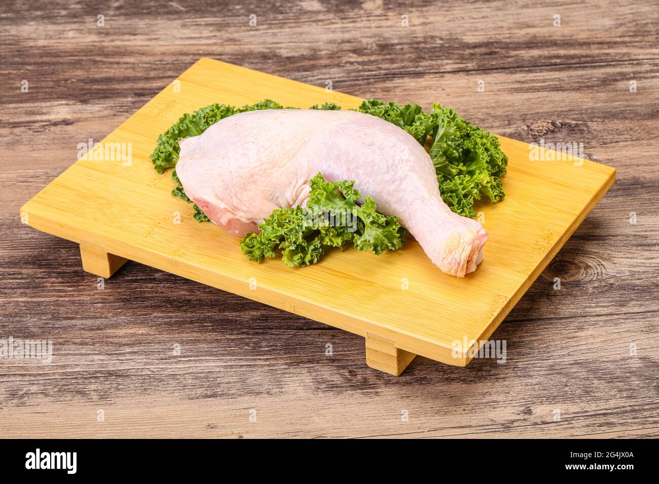 Raw uncooked chicken leg for cooking Stock Photo - Alamy