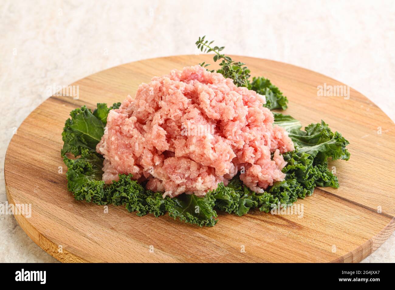 Raw pork homemade minced meat for cooking over board Stock Photo - Alamy