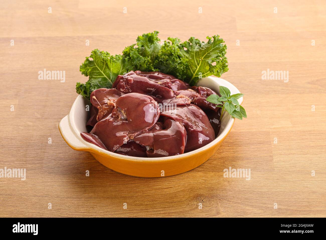 Raw chicken liver in the bowl for cooking Stock Photo - Alamy
